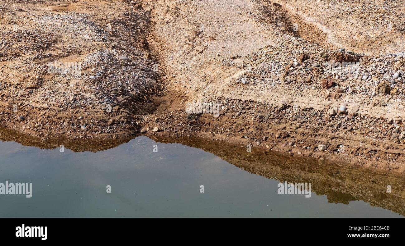 Layers of gravel and silt Stock Photo - Alamy