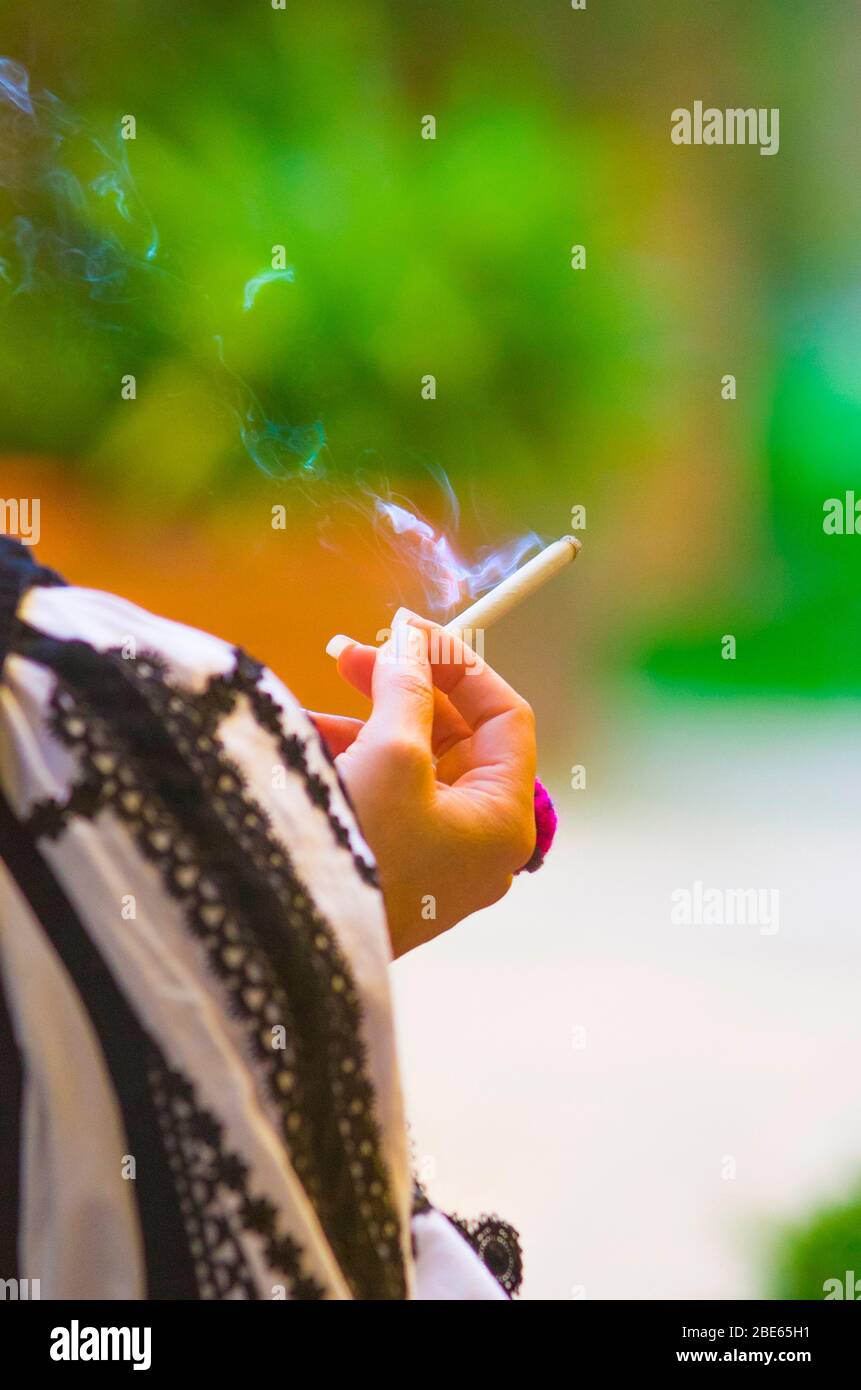 pleasure and enjoyment of slow smoking, cigarette, tobacco, lighter ...