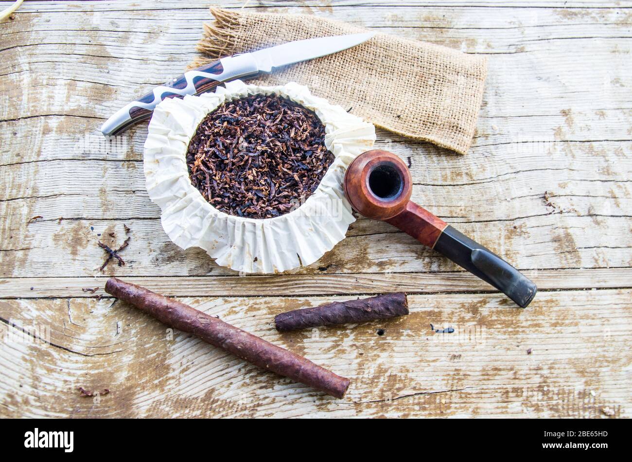 pleasure and enjoyment of slow smoking, its tools, pipe, tobacco, cigar ...