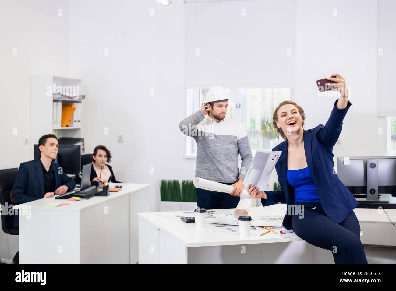 Startup team posing photo in hi-res stock photography and images - Alamy