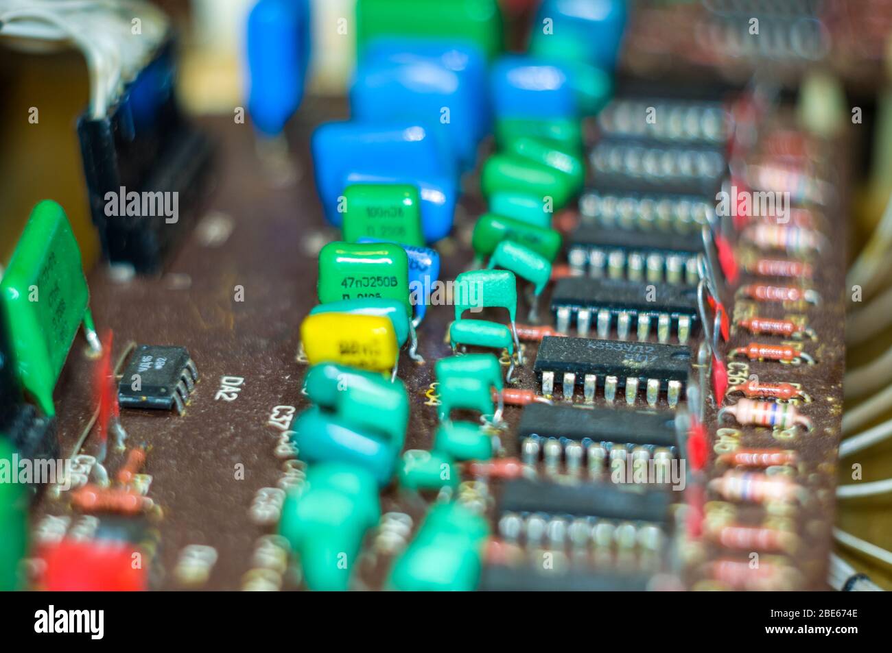 Vintage electronic circuit boards with radio parts and chips, close-up ...