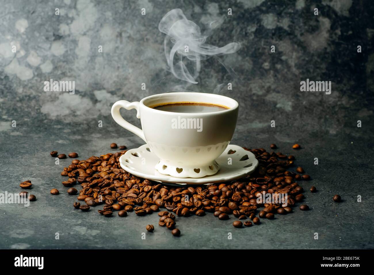 Coffee background. Coffee beans and cup on dark backgrpund. Coffee ...
