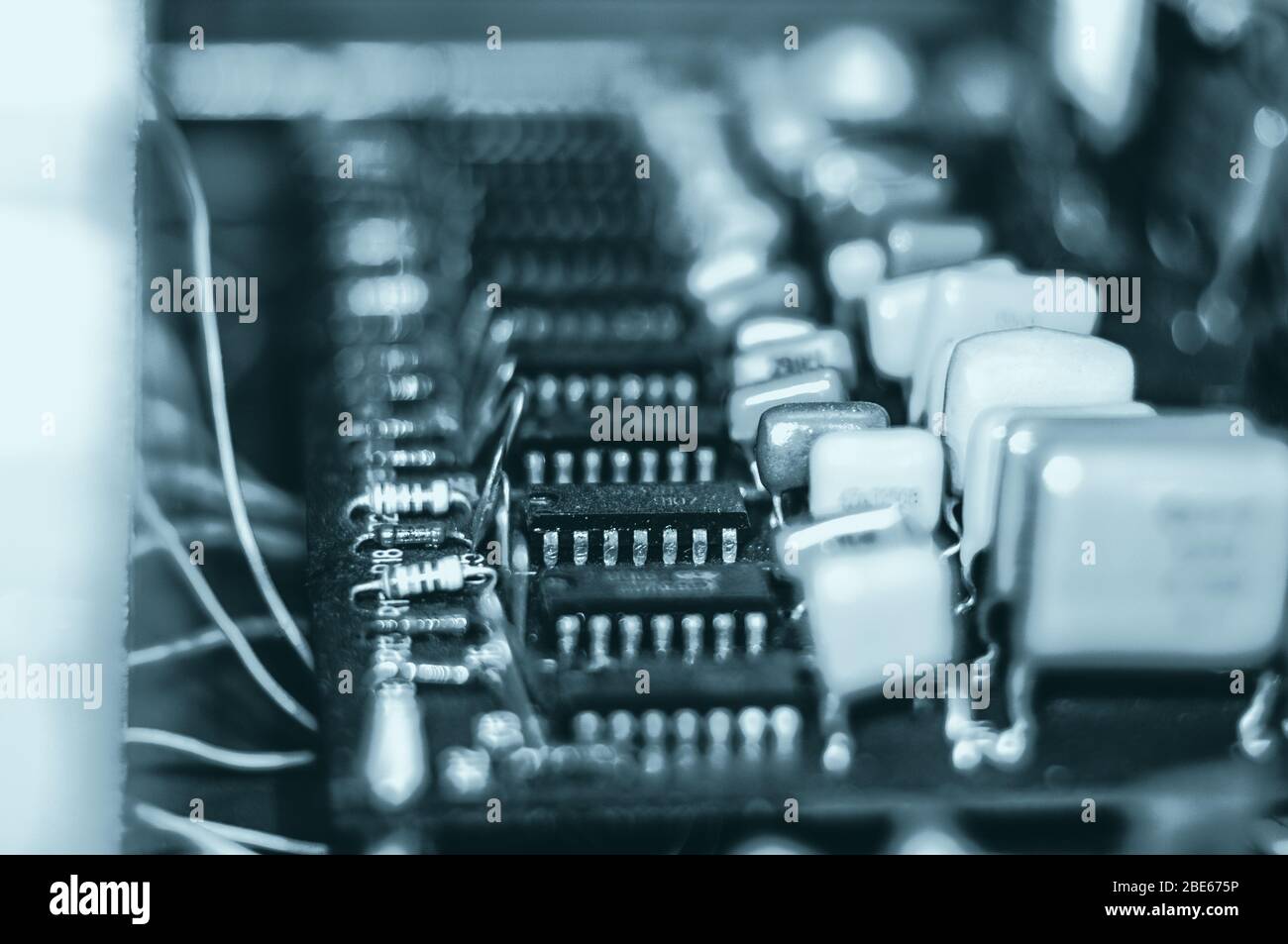 Vintage electronic circuit boards with radio parts and chips, close-up ...