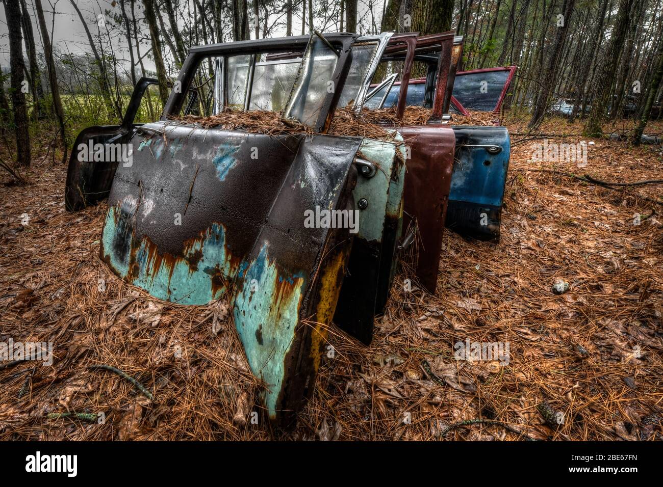 Vintage cars in a car graveyard Stock Photo - Alamy
