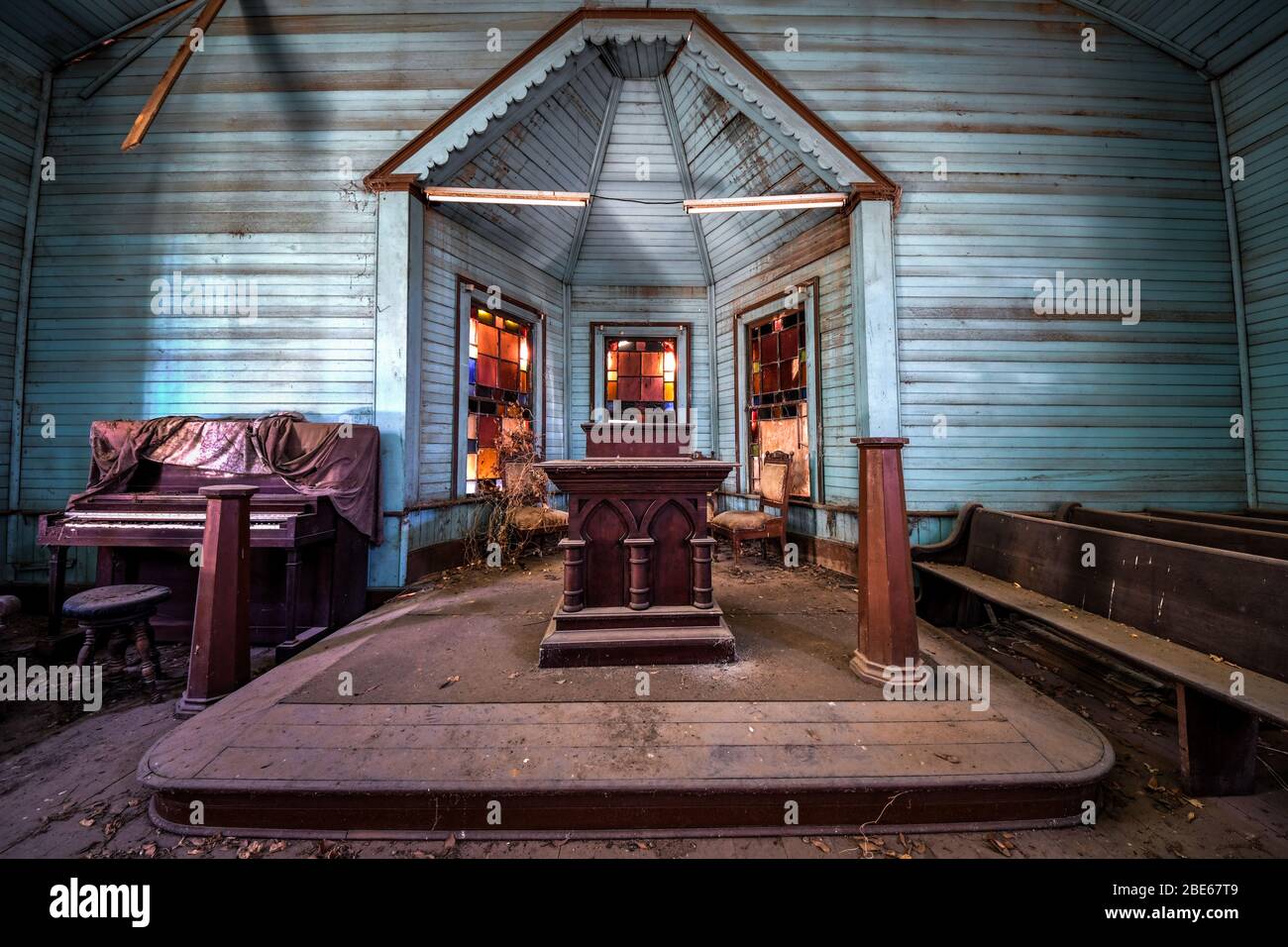 Stage and pews in an old southern church that is now closed Stock Photo ...