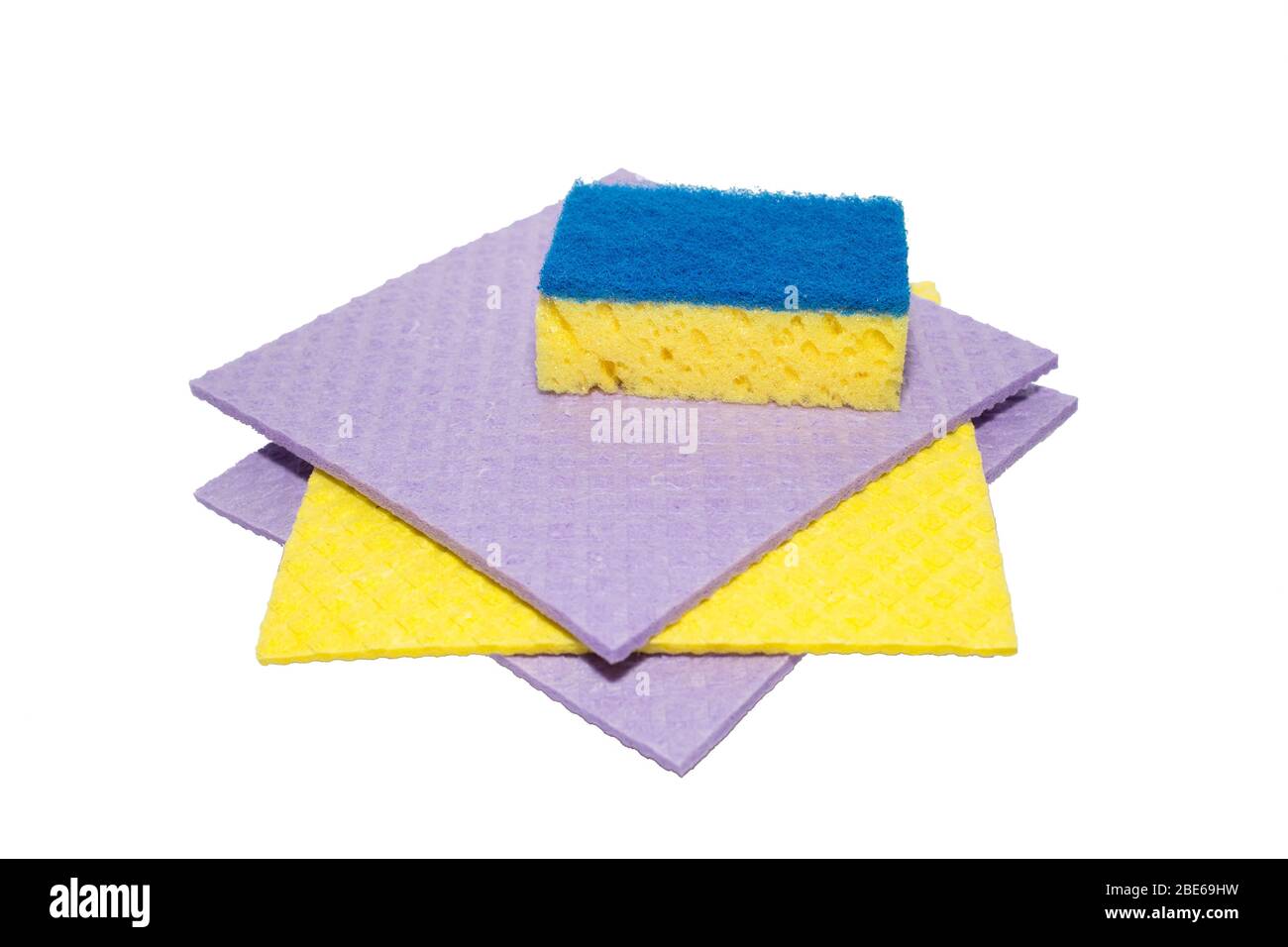 Accessories for cleaning washcloth on a white background. Yellow and ...