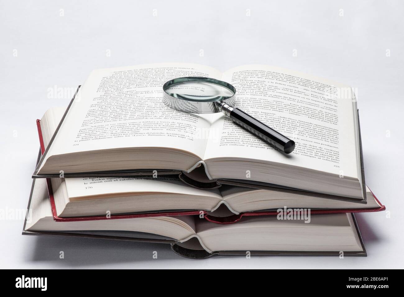 Book magnifying glass concept education hi-res stock photography and ...