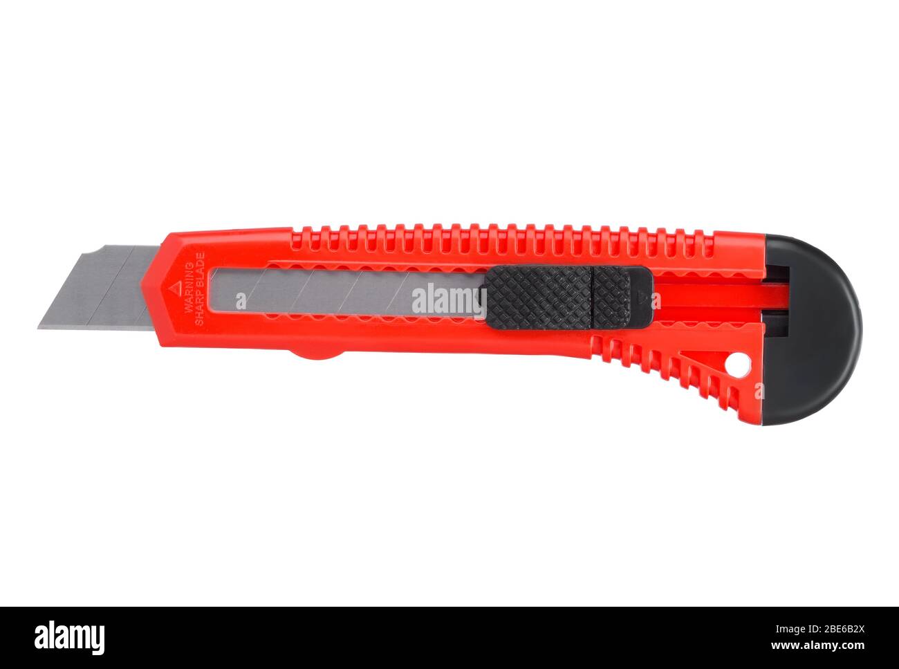 Red stationery knife with a blade isolated on a white background Stock ...