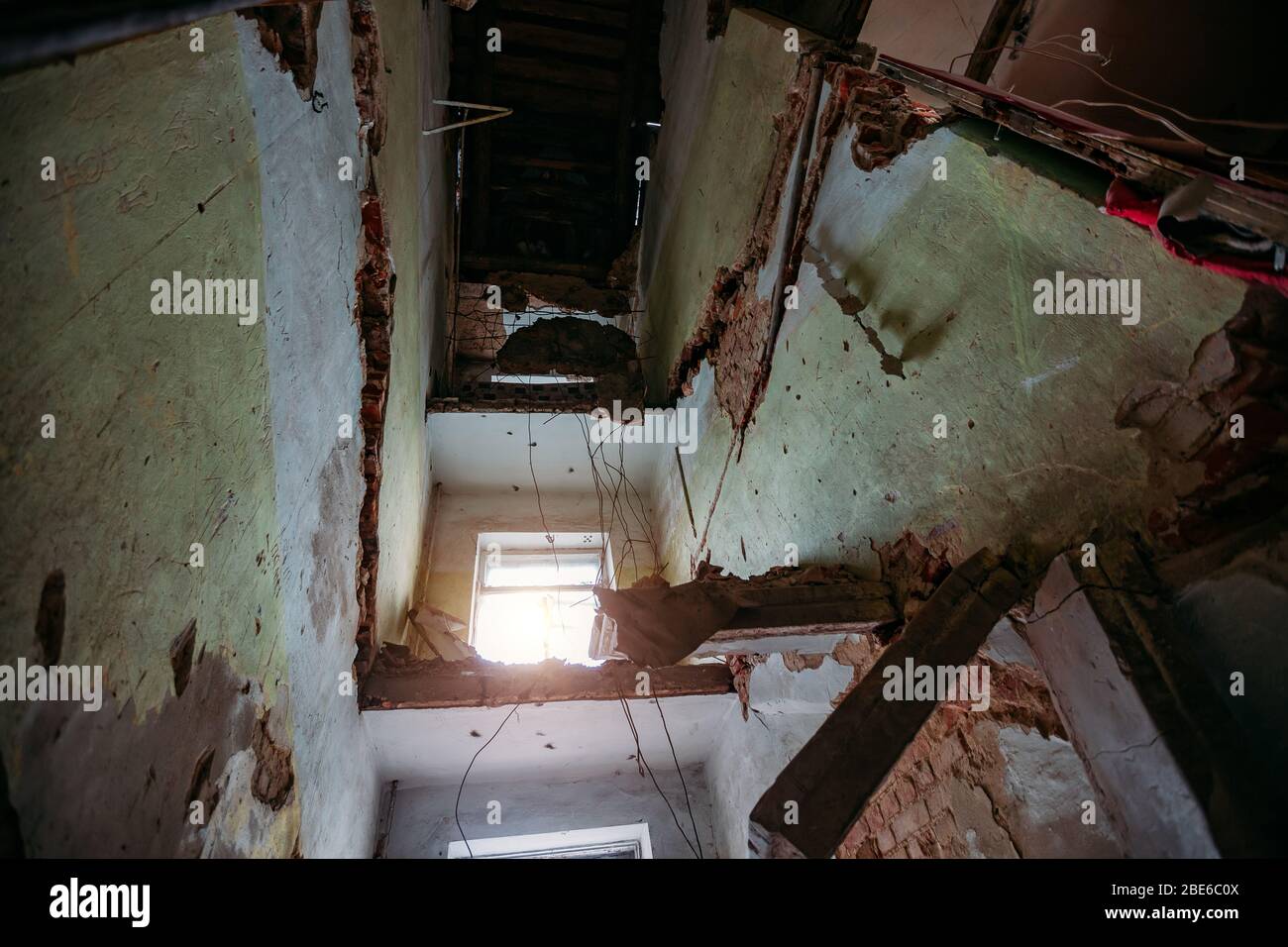 Interior of the ruined collapsed abandoned house Stock Photo - Alamy