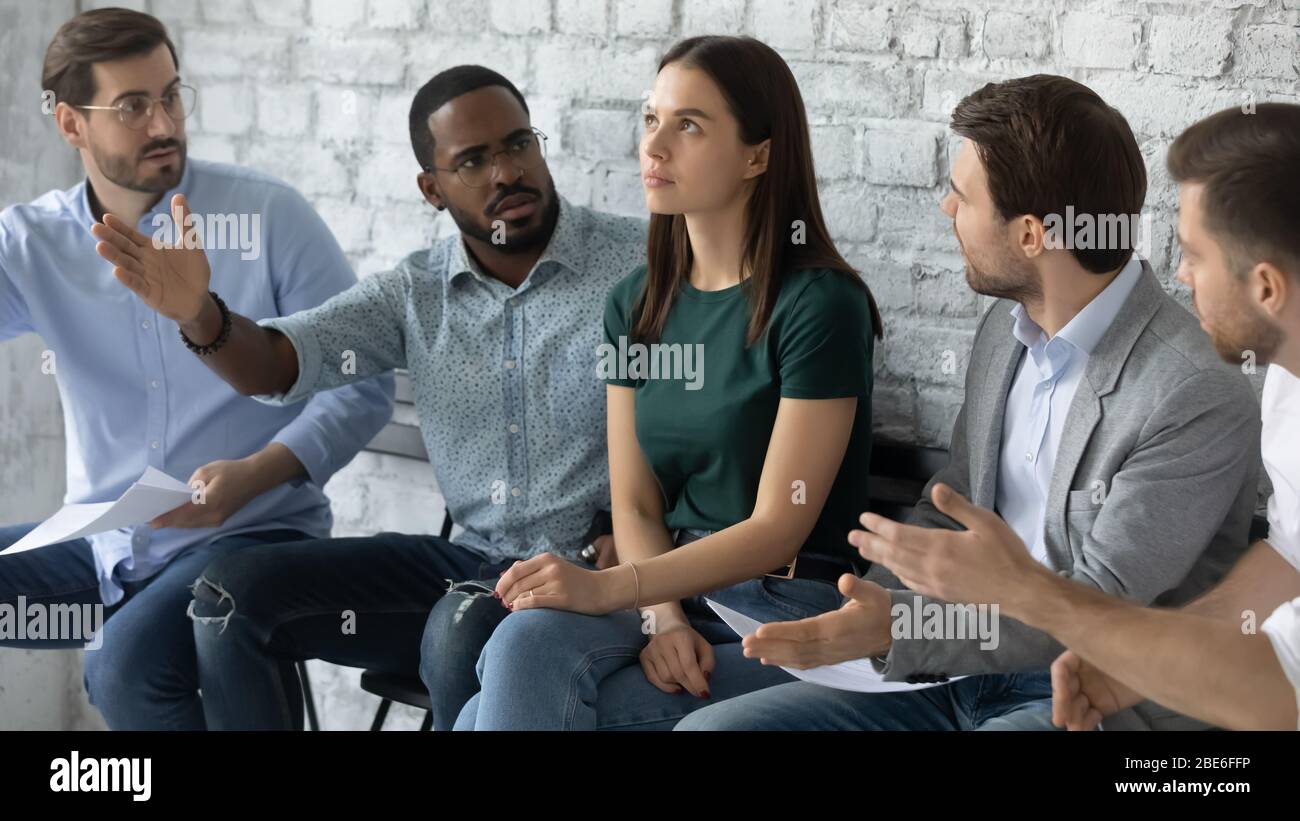 Angry male candidates argue with female applicant before interview ...