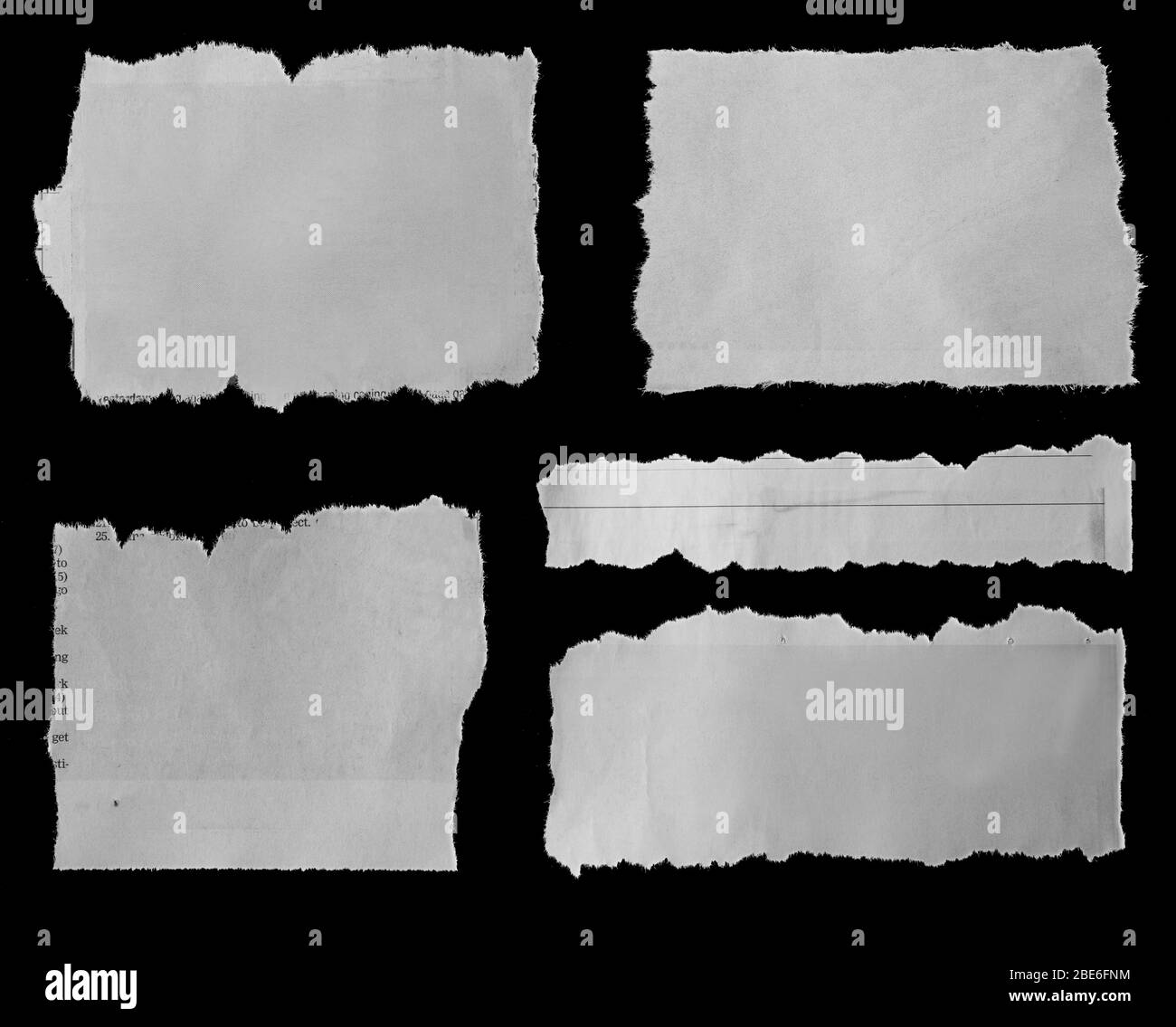 Five pieces of torn newspaper on black background Stock Photo - Alamy