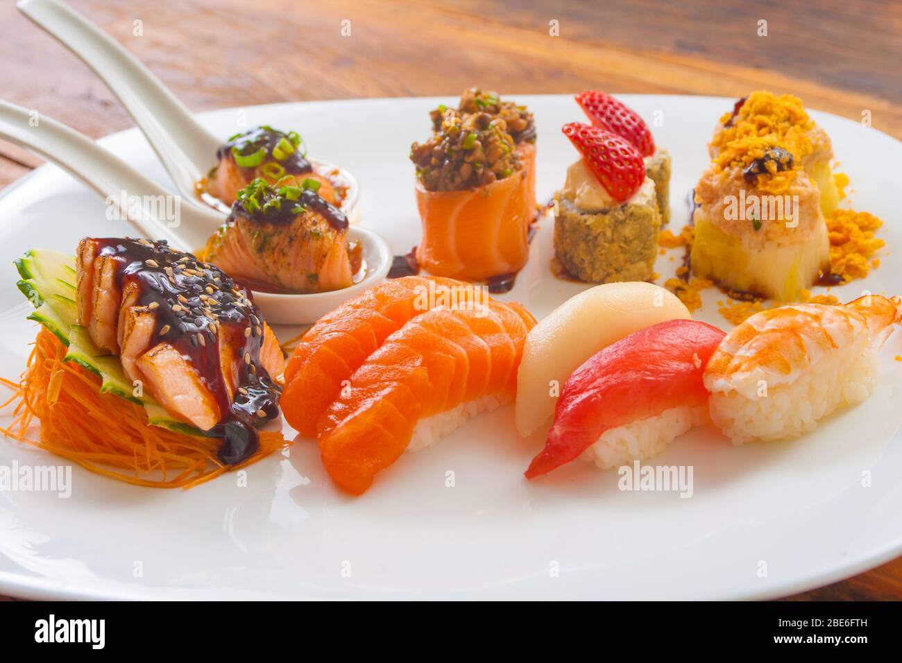 Traditional Japonese Food with sushu, sashimi and rolls Stock Photo - Alamy