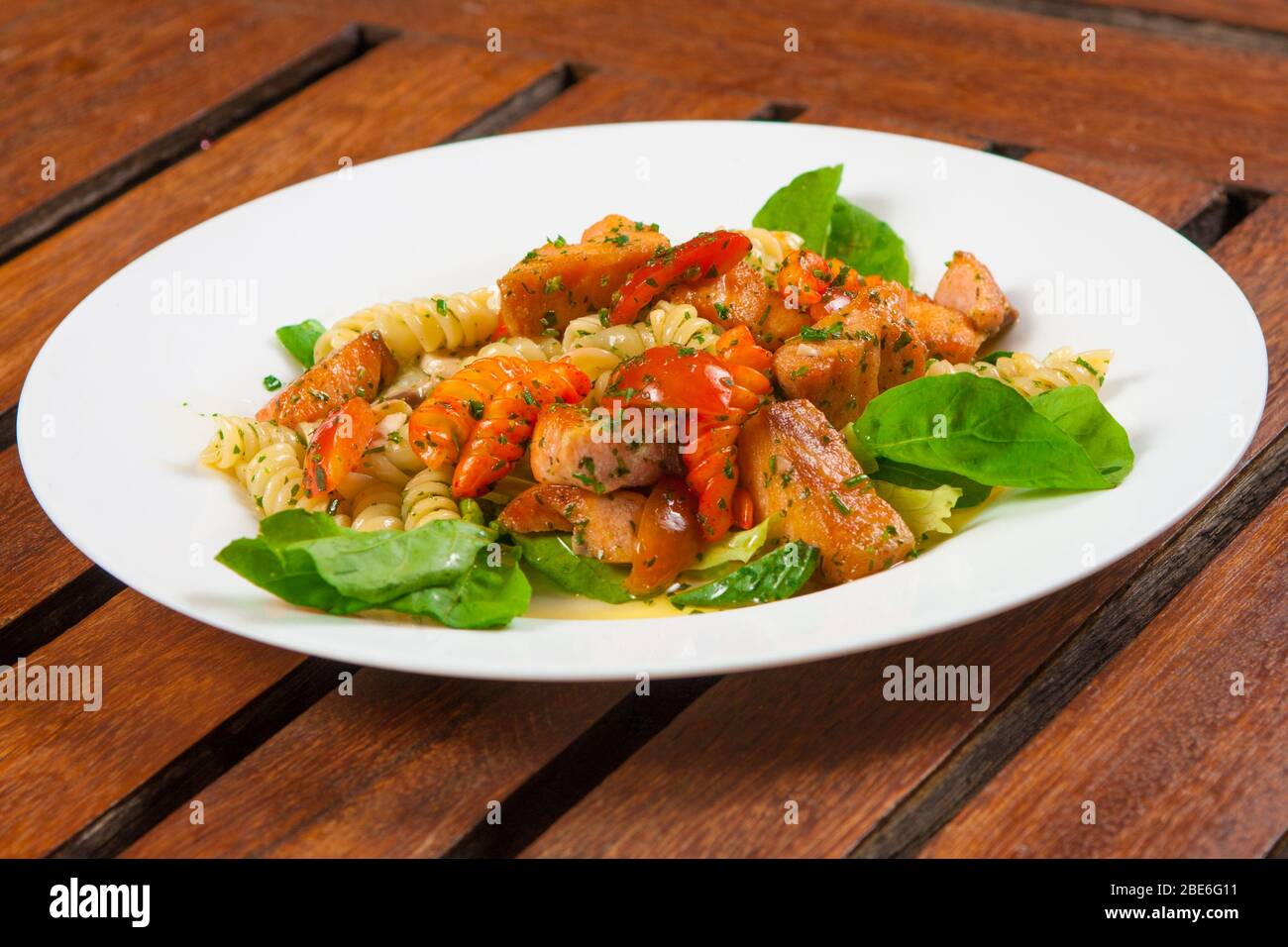 Salmon With Fusilli and salad Stock Photo - Alamy