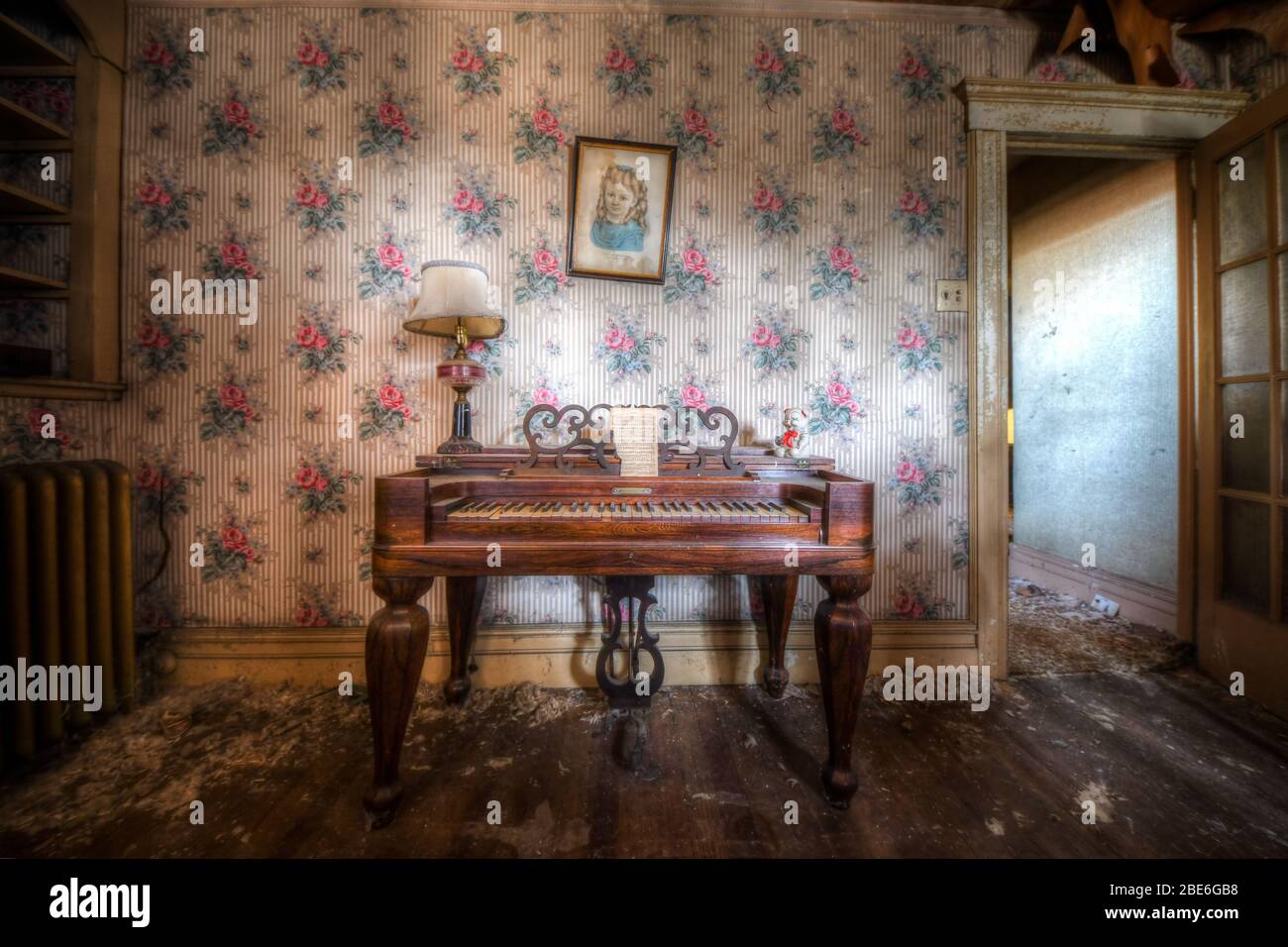 Piano music room in abandoned house with wallpaper and antiques Stock ...