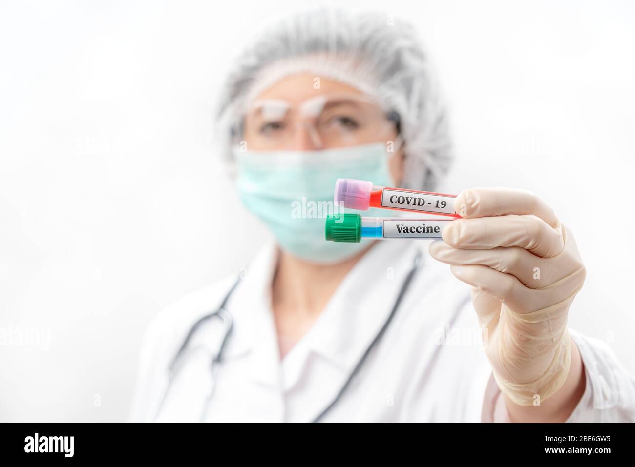 Doctor nurse in a hospital laboratory clinic showing test tubes with ...