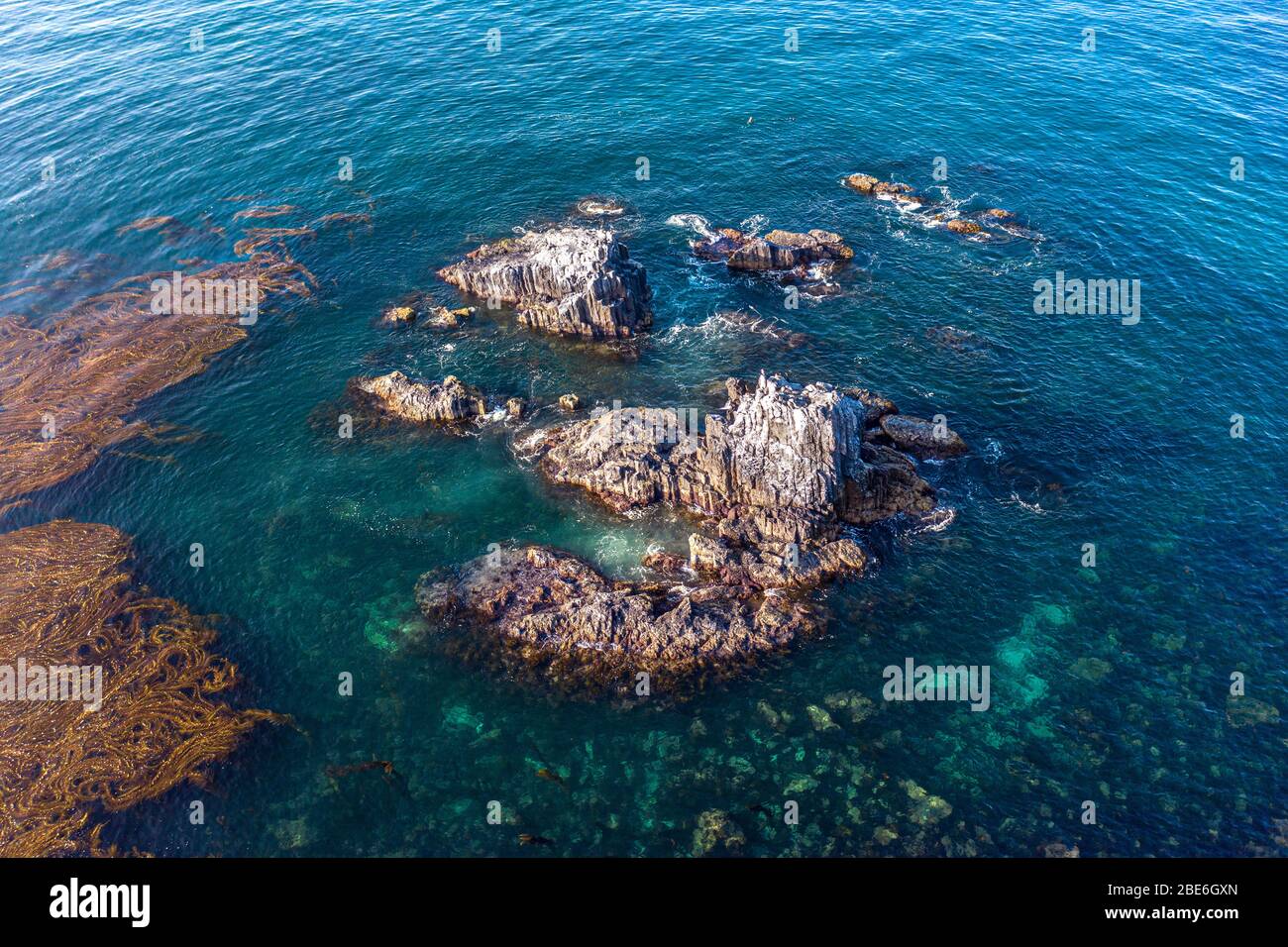 An aerial drone image of famous Seal Rocks in Laguna Beach is a ...