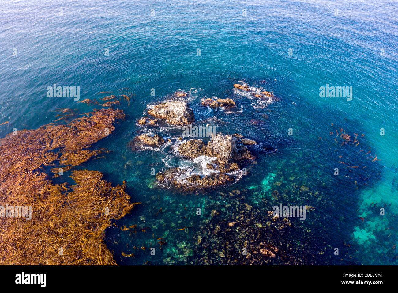 An aerial drone image of famous Seal Rocks in Laguna Beach is a ...