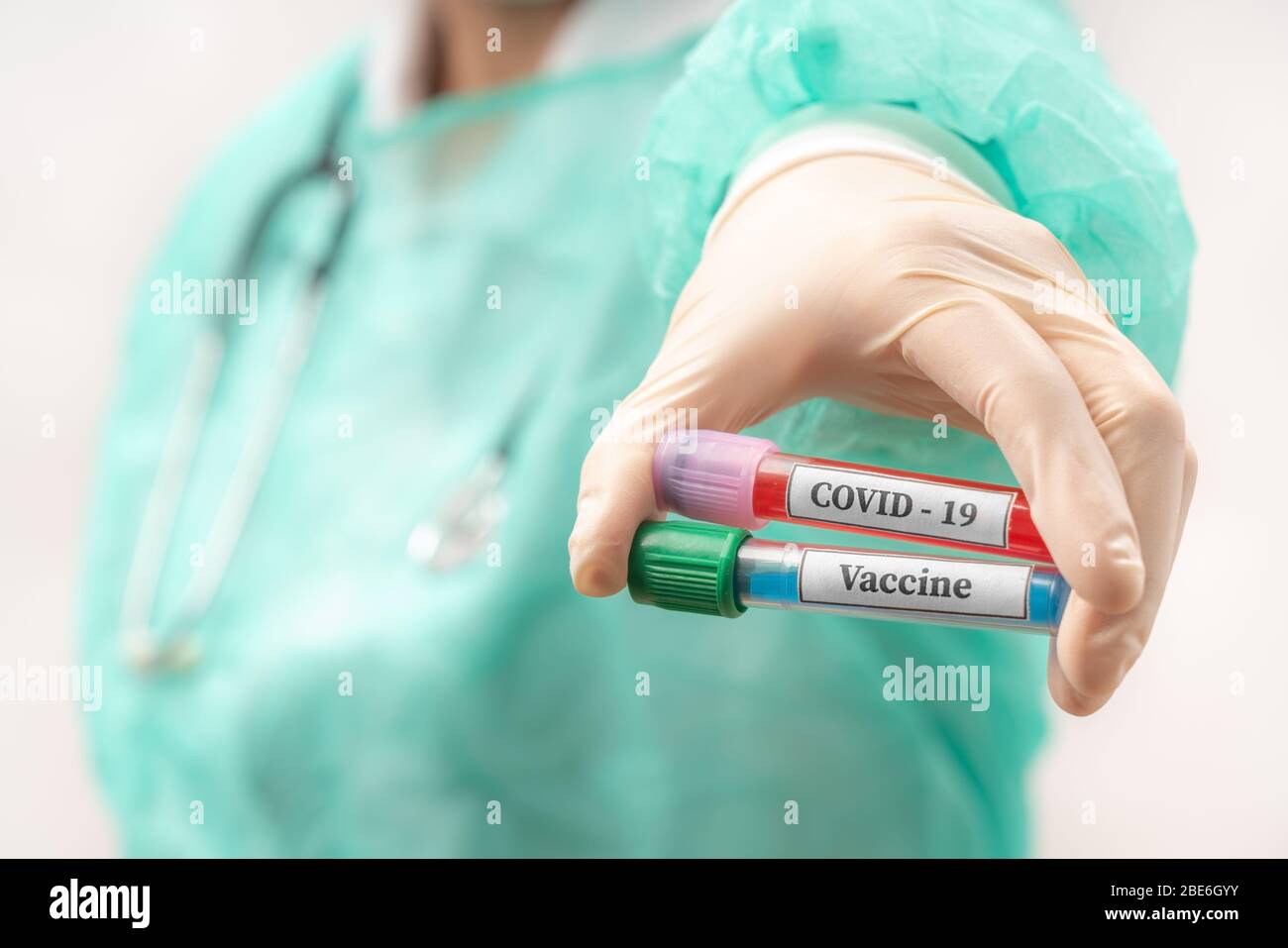 Doctor nurse in a hospital laboratory clinic showing test tubes with ...