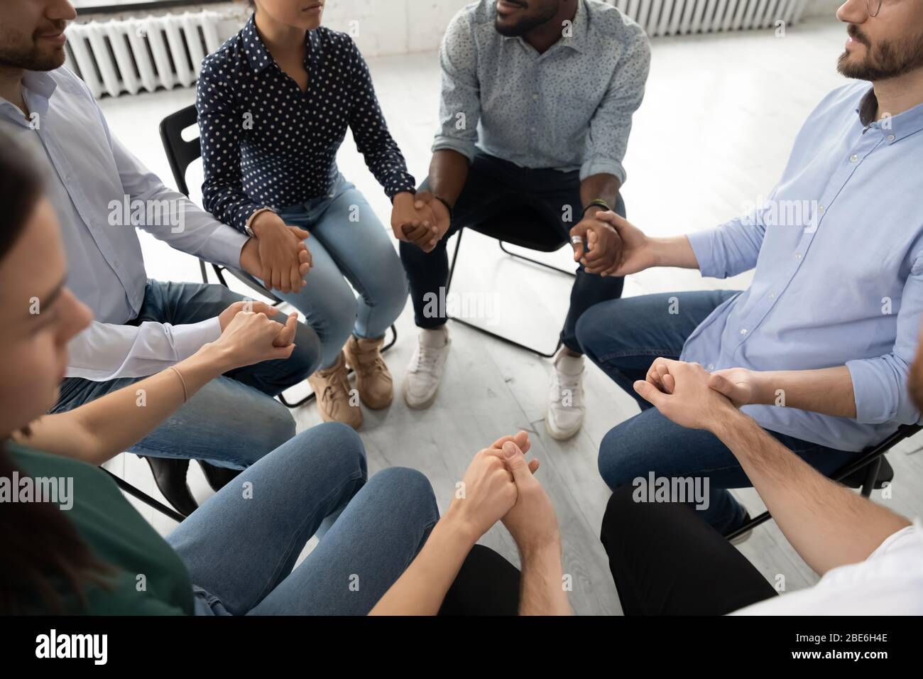 People hold hands circle together hi-res stock photography and images ...