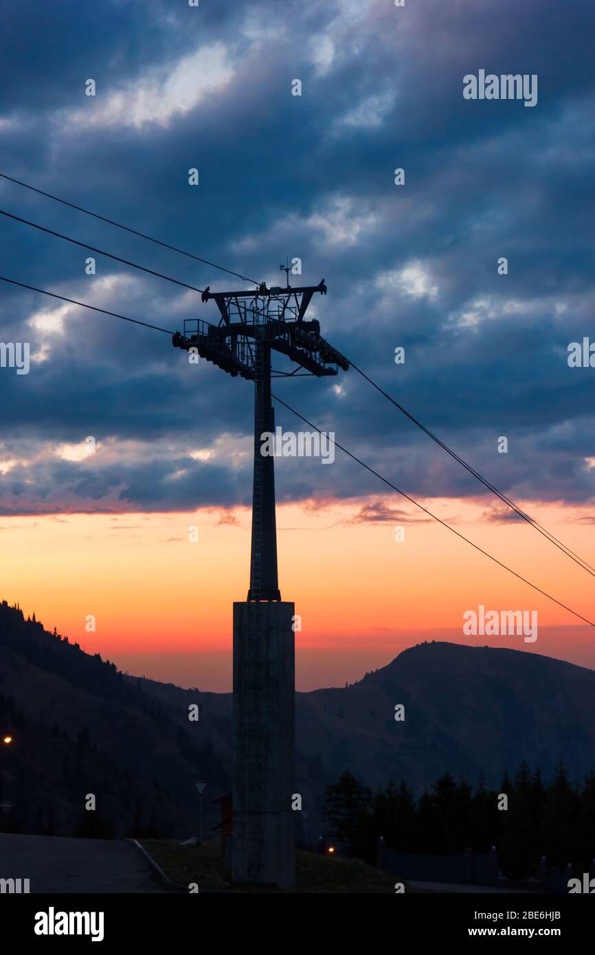 Mountain ski lift silhouette on sunset background Stock Photo - Alamy