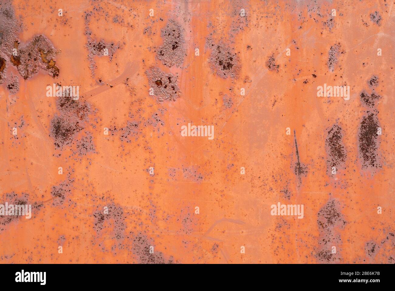 Close-up of a metal or steel plate, covered with old paint. Cracking ...