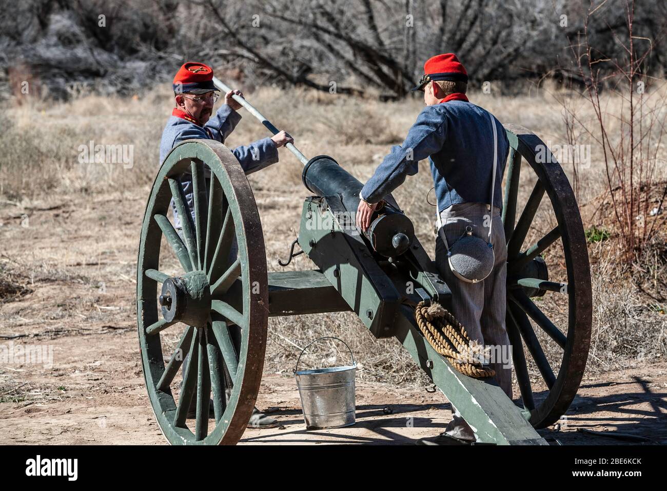 Confederate Army artillery soldiers prepare to fire cannon, Civil War ...
