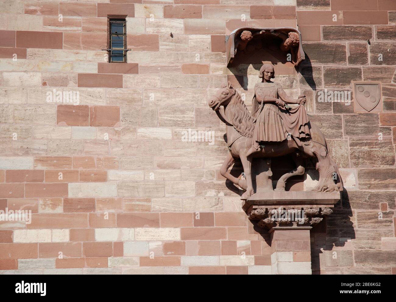 old antique sculpture at the facade of the Munster Church in Basel ...