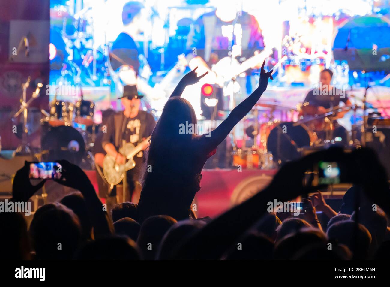 Fans at live rock music concert cheering Stock Photo - Alamy