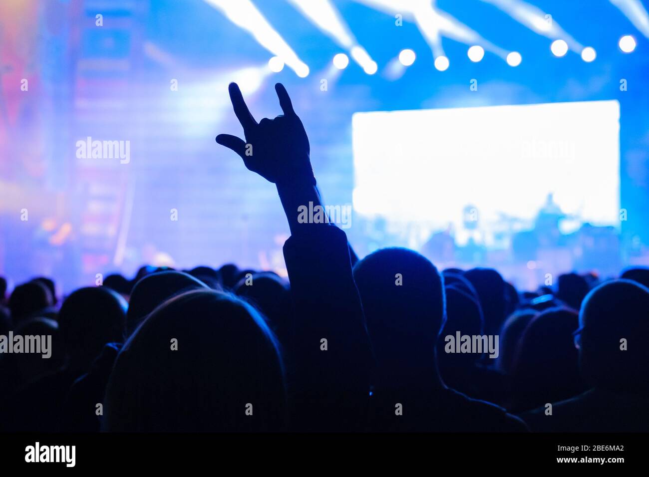 Fans at live rock music concert cheering Stock Photo - Alamy