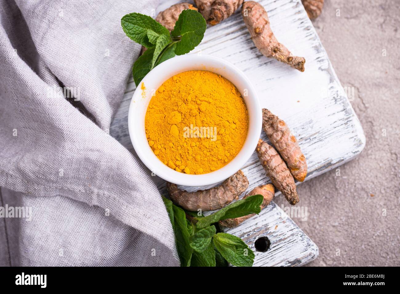 Turmeric powder and curcuma root Stock Photo - Alamy