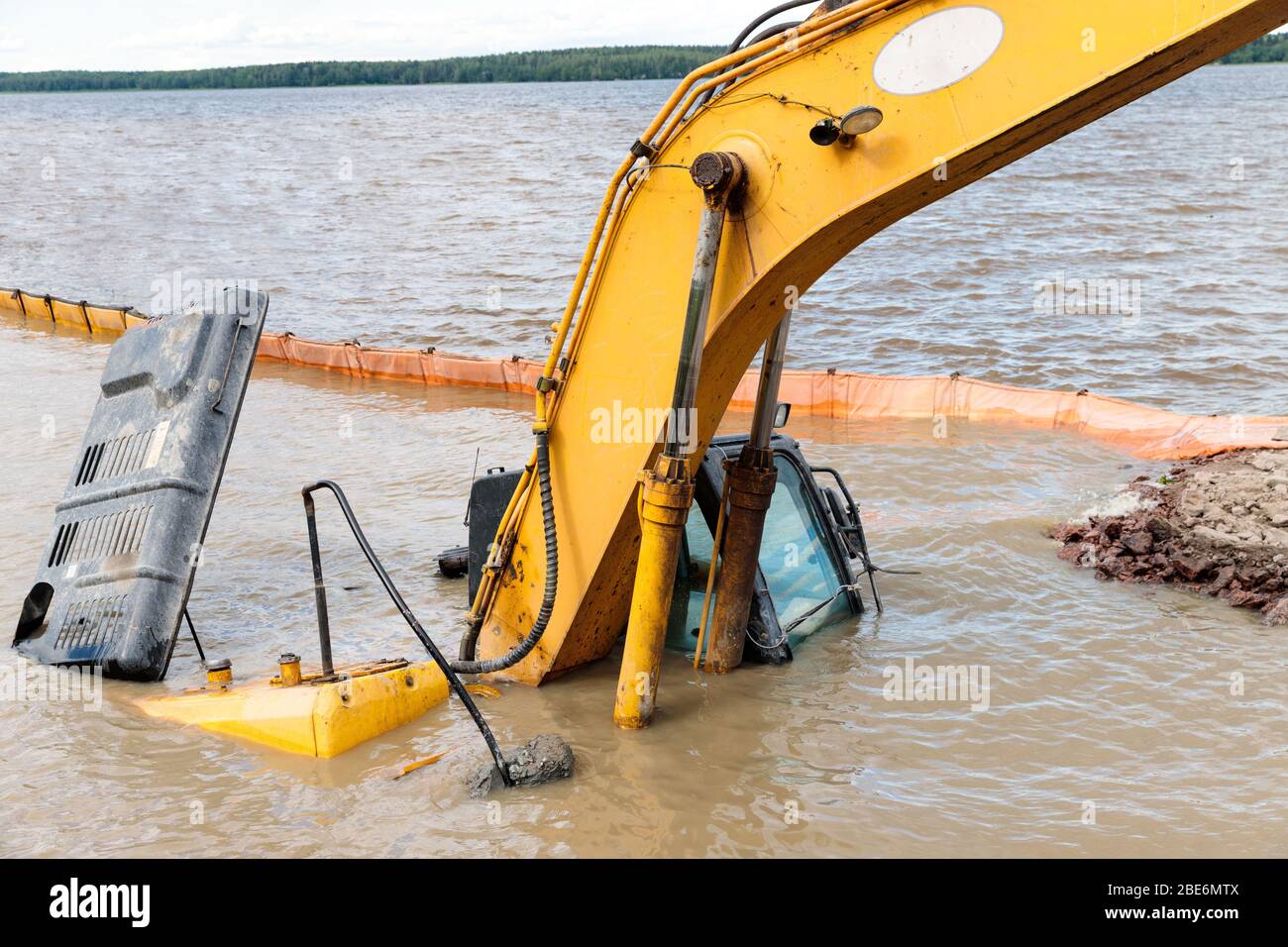 Close up of yellow excavator(construction equipment) drowned on the ...