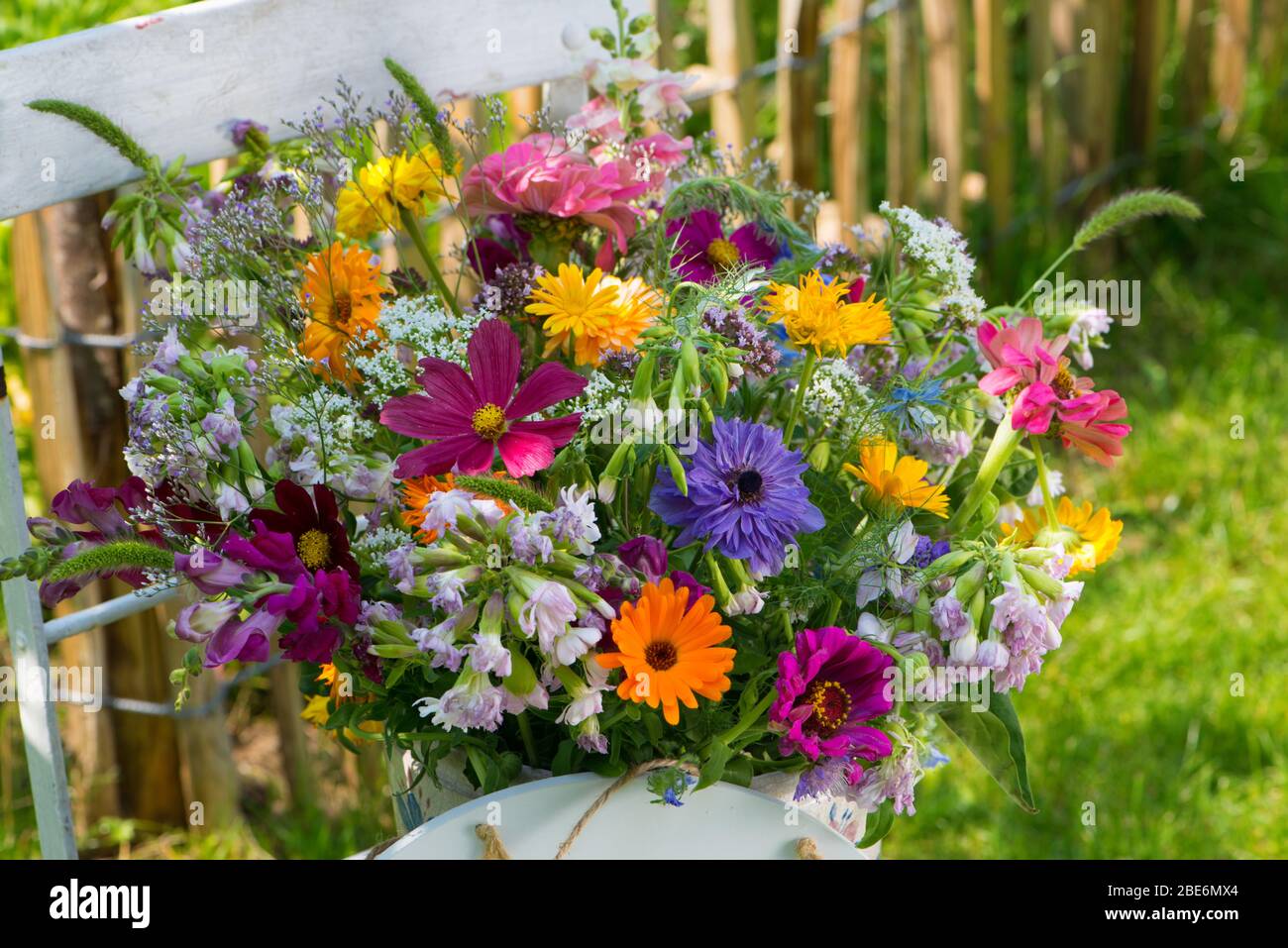 Big colorful wild flowers bouquet in a pot Stock Photo - Alamy