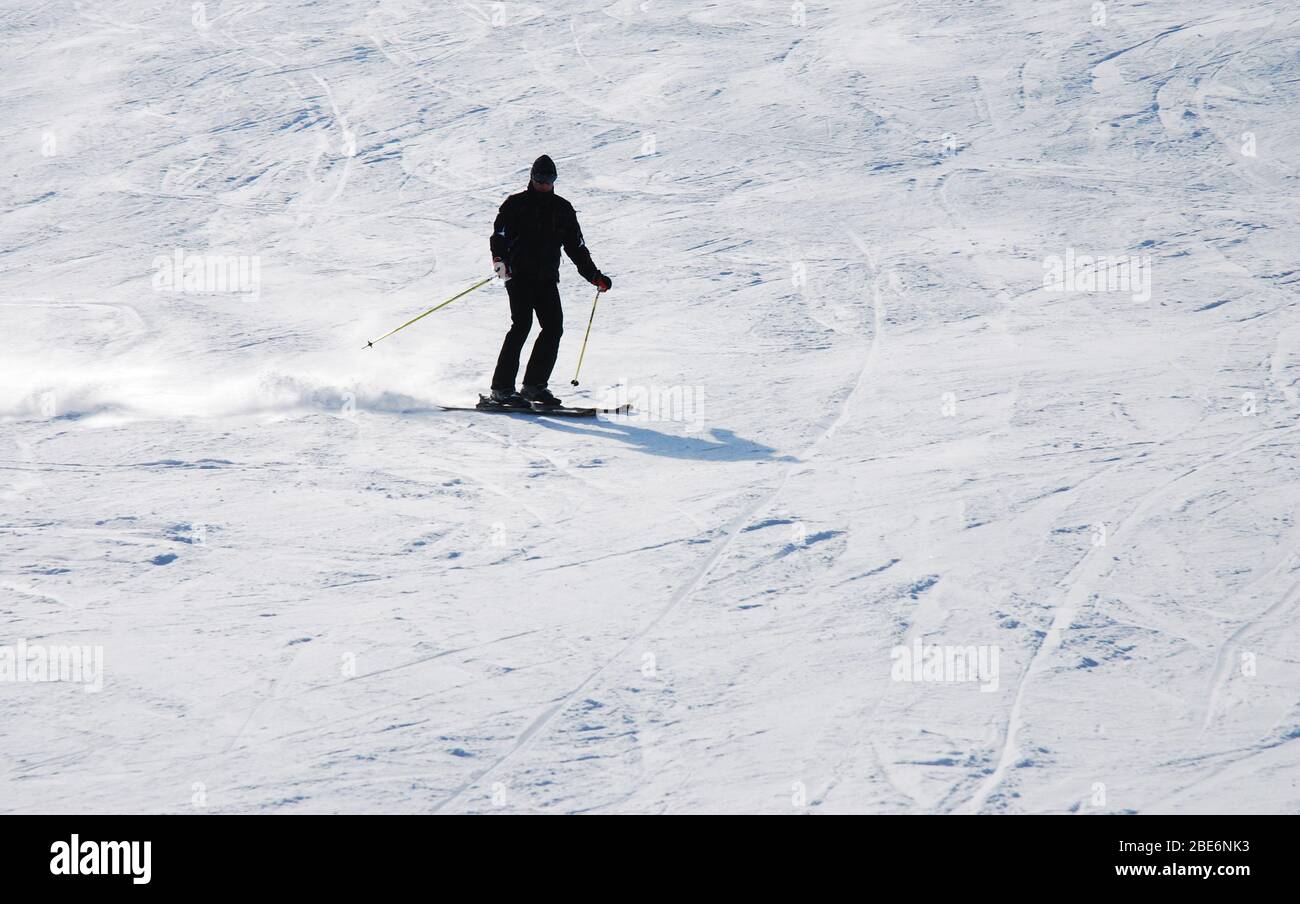 Skiing on the snow track Stock Photo - Alamy