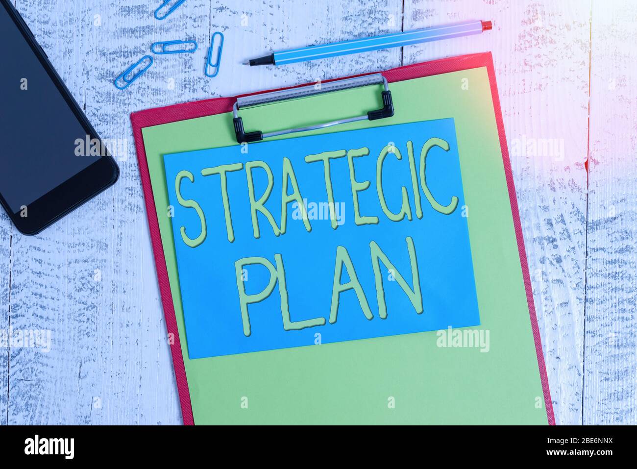 Writing note showing Strategic Plan. Business concept for a systematic ...