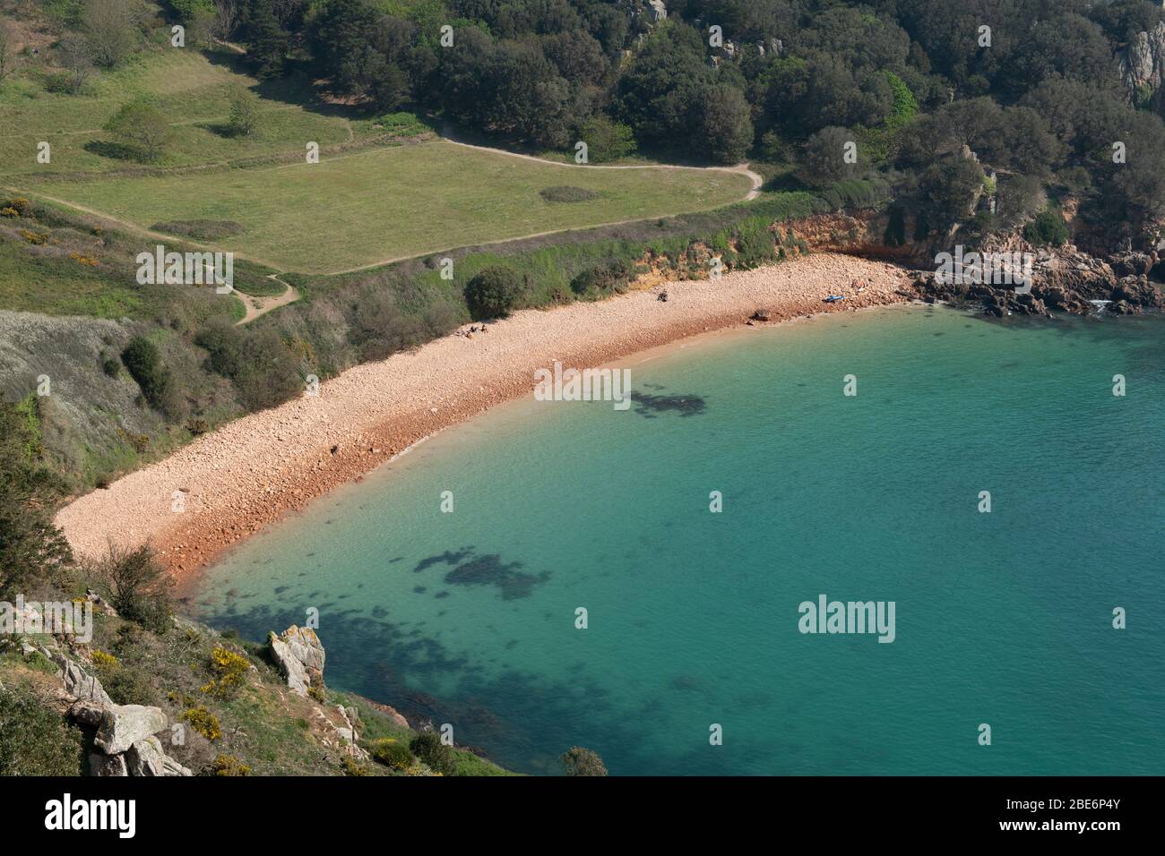 Sunny day and clear, calm sea at Beauport Beach, St. Brelade, Jersey ...