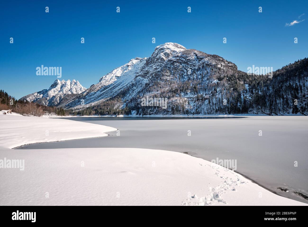Panoramic view of Lake Predil, the five peaks and the Alps around ...