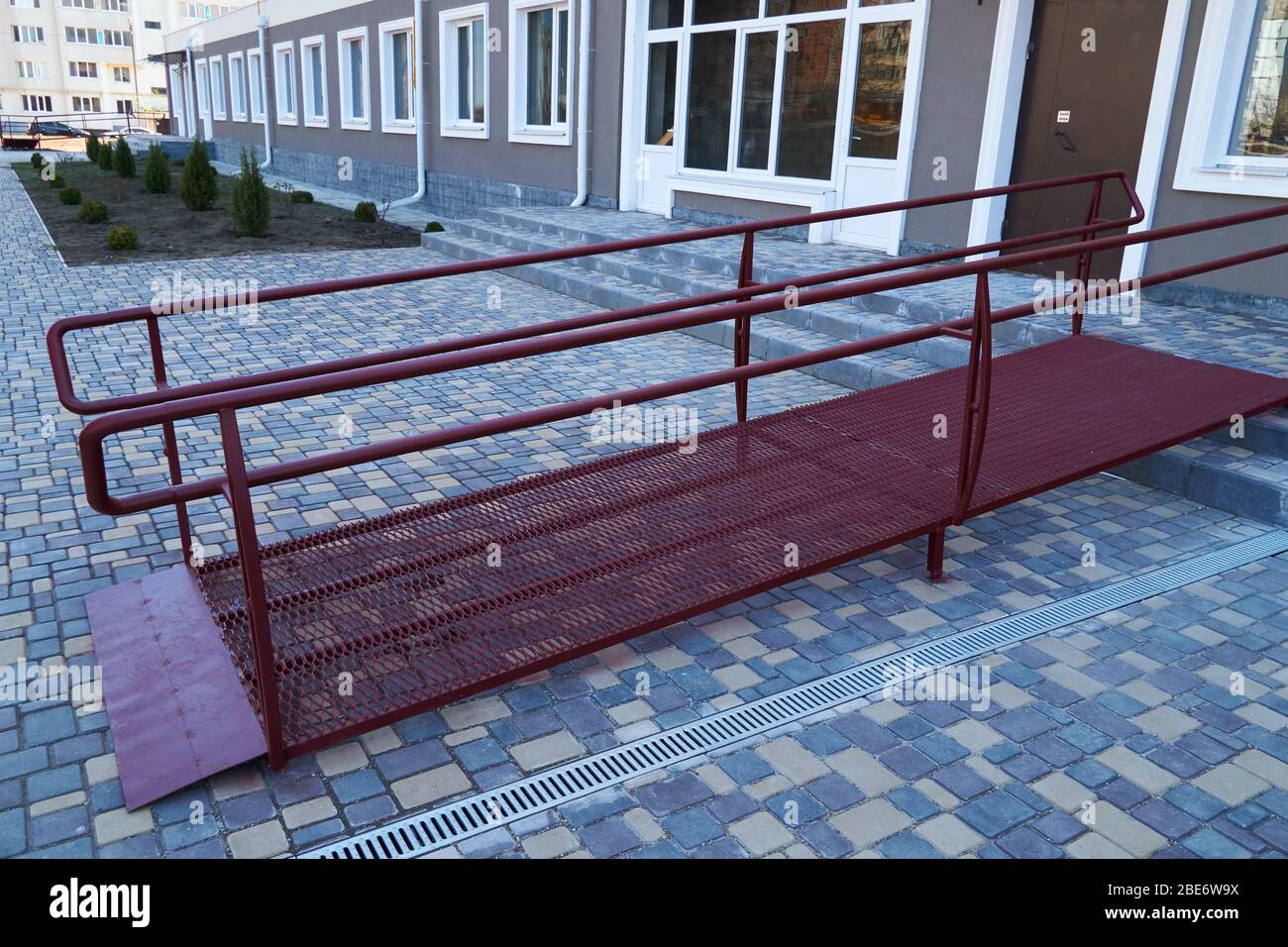 Wheelchair access ramp for entrance of residential multistory building ...
