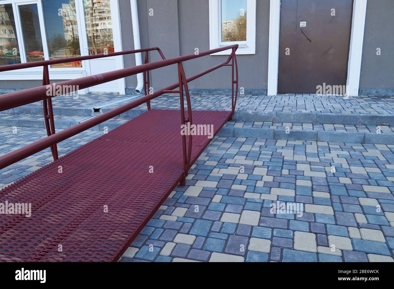 Wheelchair access ramp for entrance of residential multistory building ...