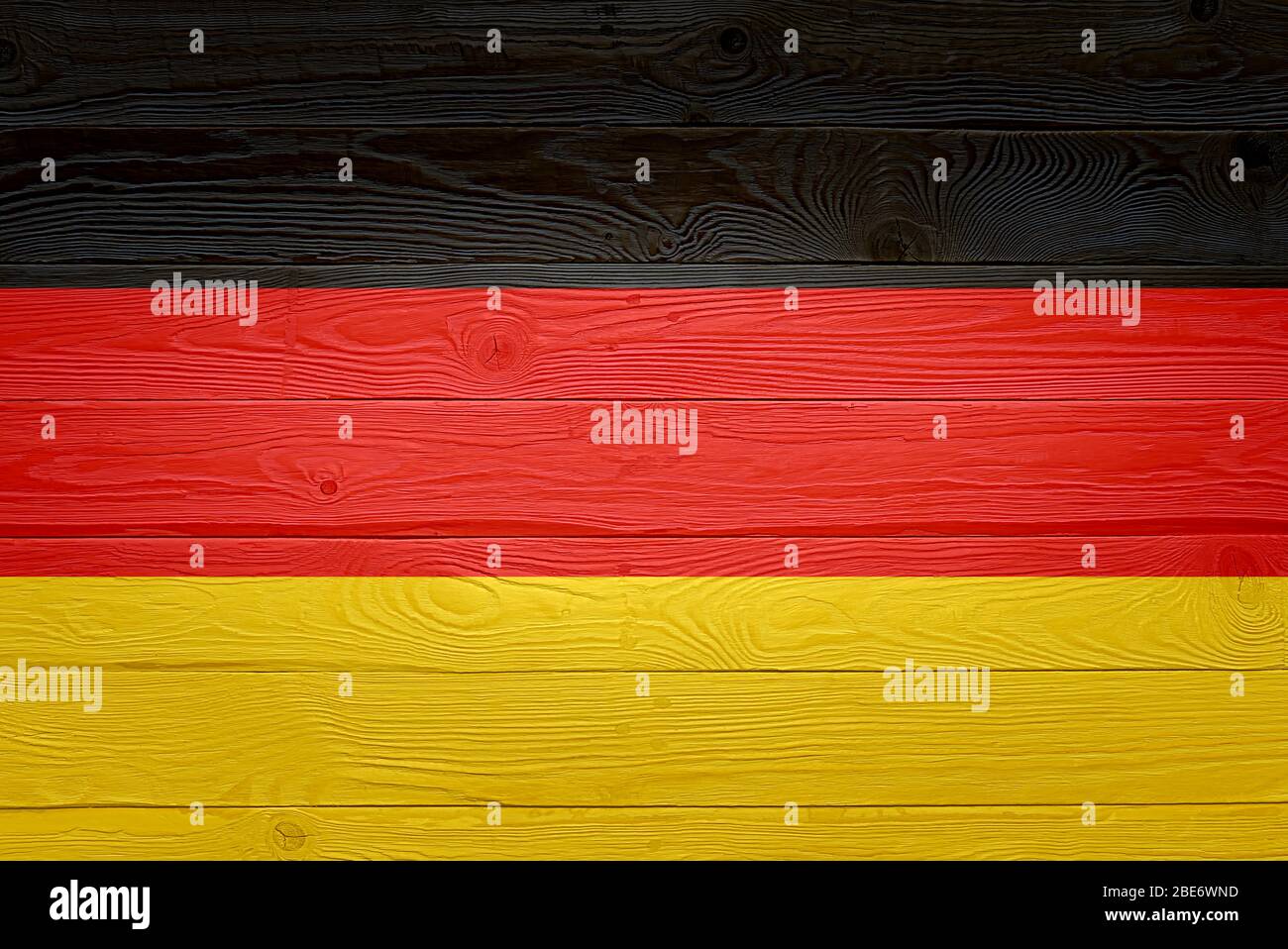 Germany flag painted on old wood plank background. Brushed natural ...