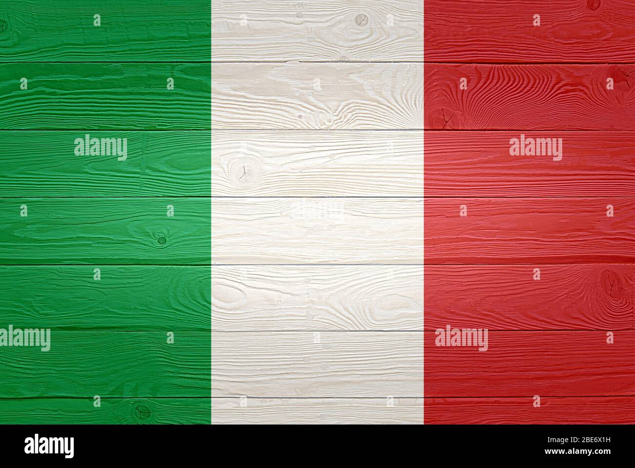 Italy flag painted on old wood plank background. Brushed natural light ...