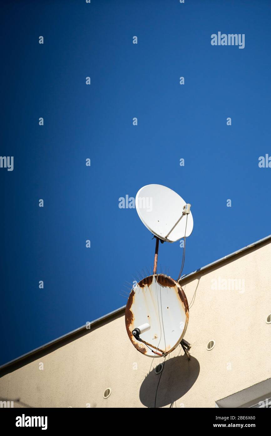 Round satellite dishes are receivers of electromagnetic waves ...