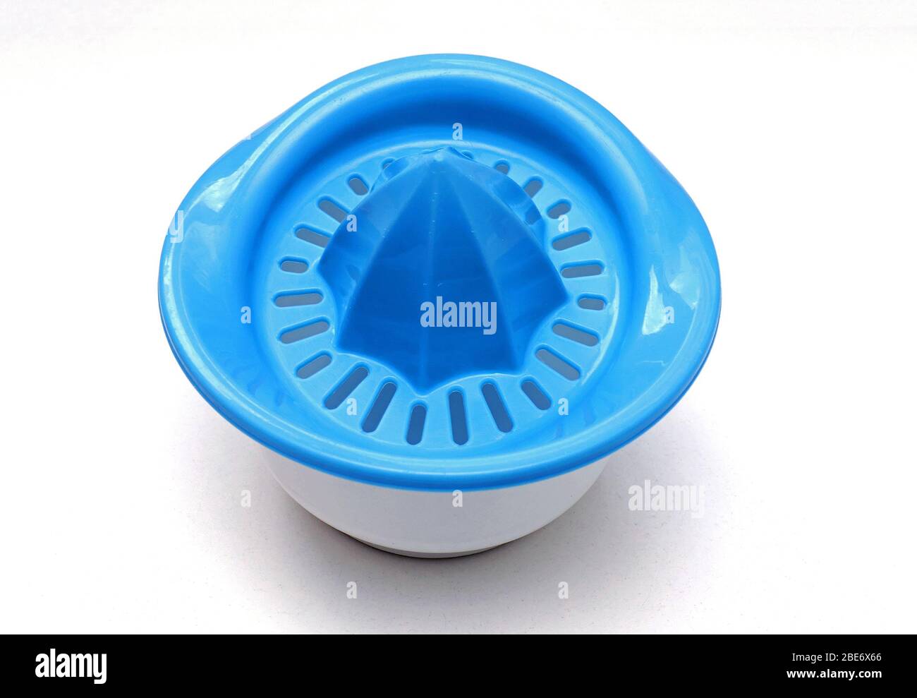Plastic juice squeezer isolated on white background Stock Photo - Alamy