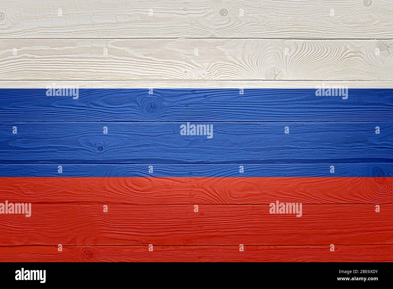 Russia flag painted on old wood plank background. Brushed natural light ...