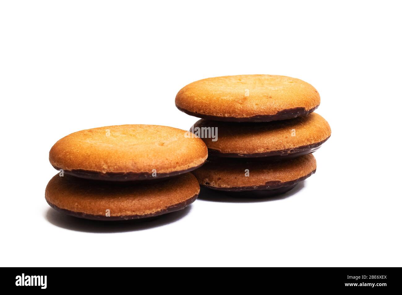 Round sponge cookies isolated on white background Stock Photo - Alamy