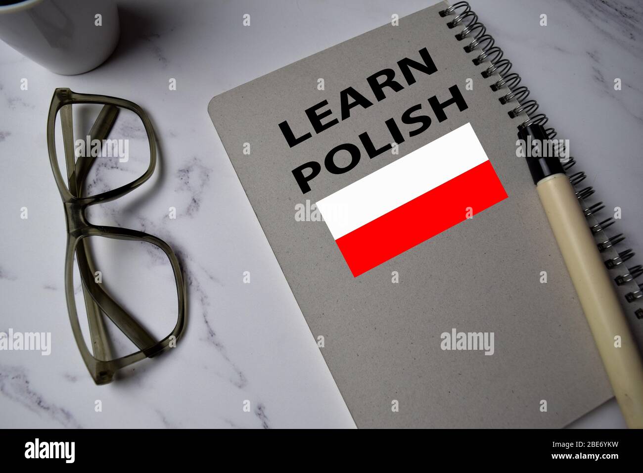 Learn Polish write on a book isolated on Office Desk Stock Photo - Alamy