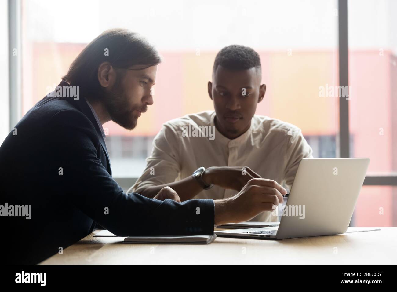 Two diverse company employees multiracial hi-res stock photography and ...