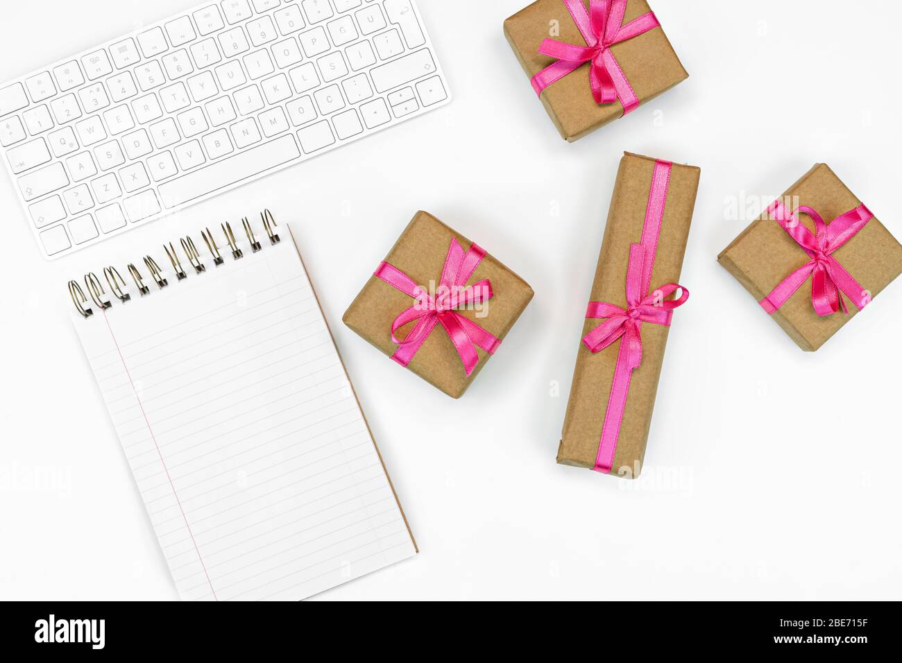 flat lay of White office desk table . computer keyboard note book and ...