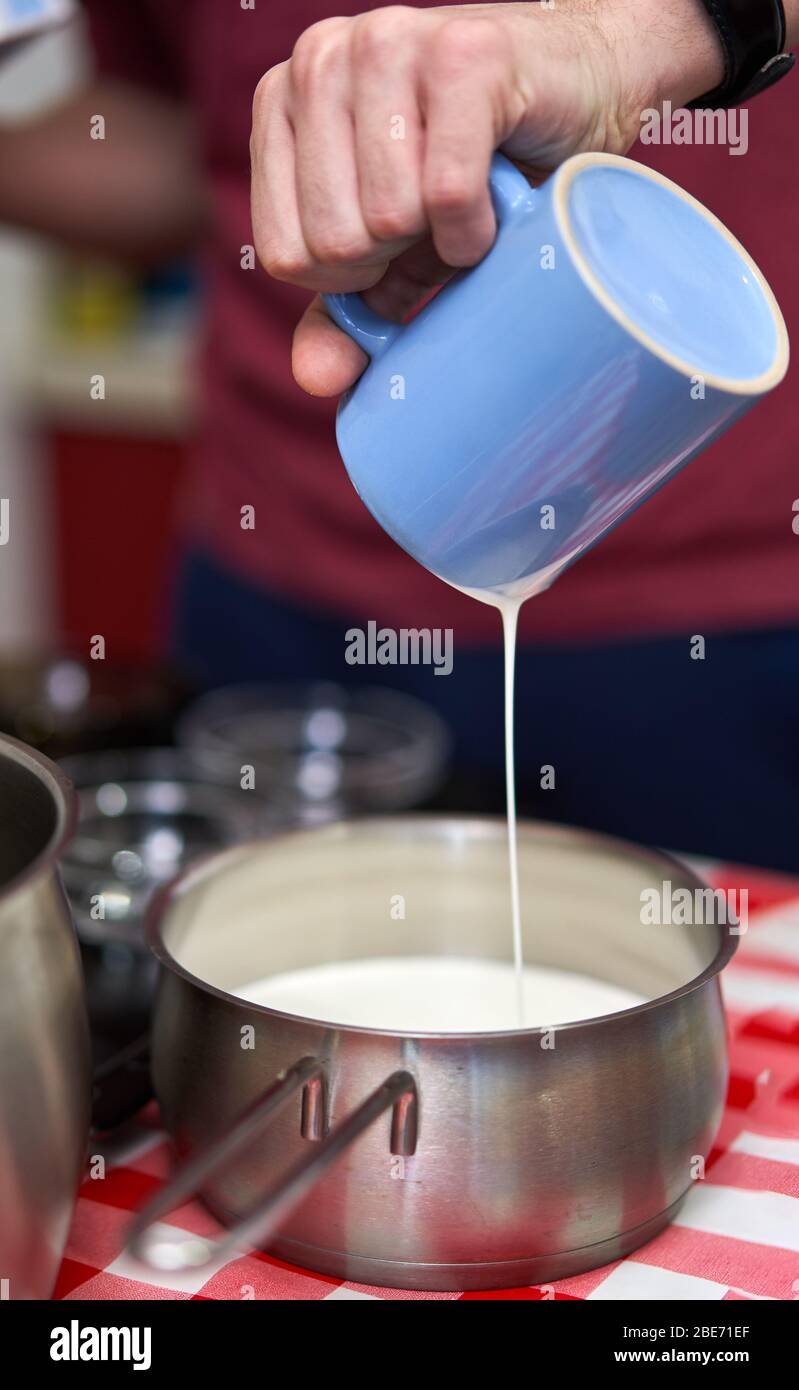 Teen pouring milk hi-res stock photography and images - Alamy