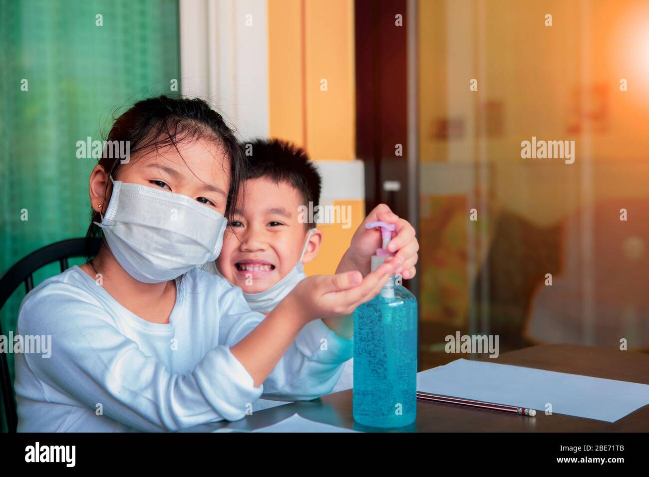 Asian children wash hand hi-res stock photography and images - Alamy