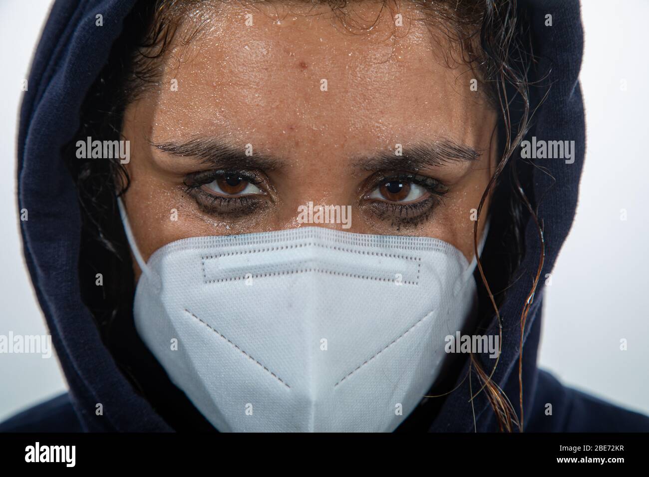 female corana patient with high fever wearing a face mask Stock Photo ...